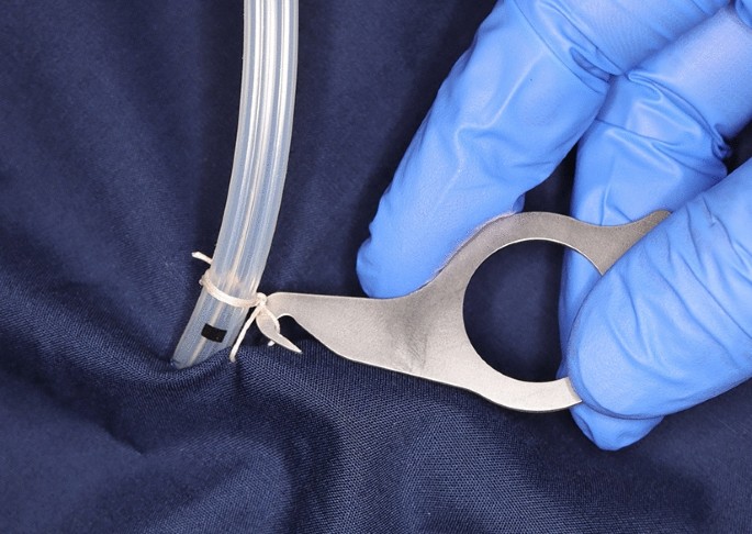 The Key Ripper: a specialized fixed suture-cutting device to facilitate ...