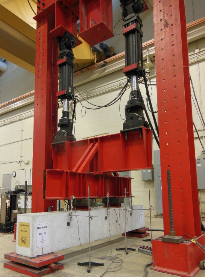 Bond behavior of full-scale beams using sustainable self-compacting ...