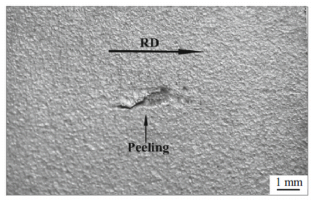 Phenomenological Model Describing the Formation of Peeling Defects on ...
