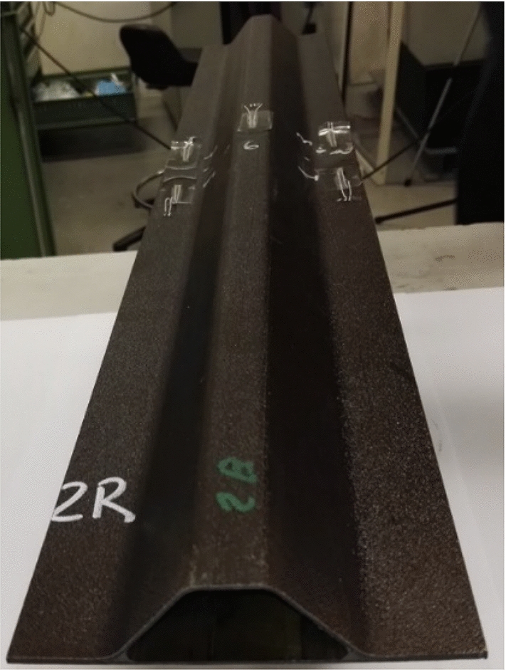 Experimental and numerical study of composite omega stringer–skin ...